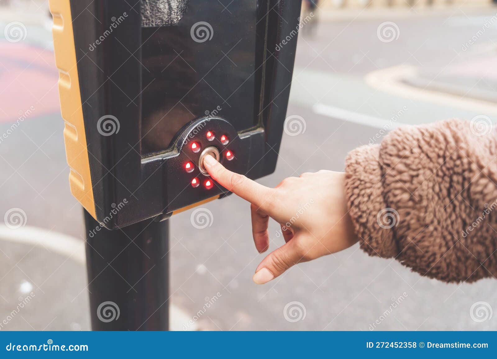 Woman Crossing Road and Pressing the Traffic Light Button Stock Photo ...