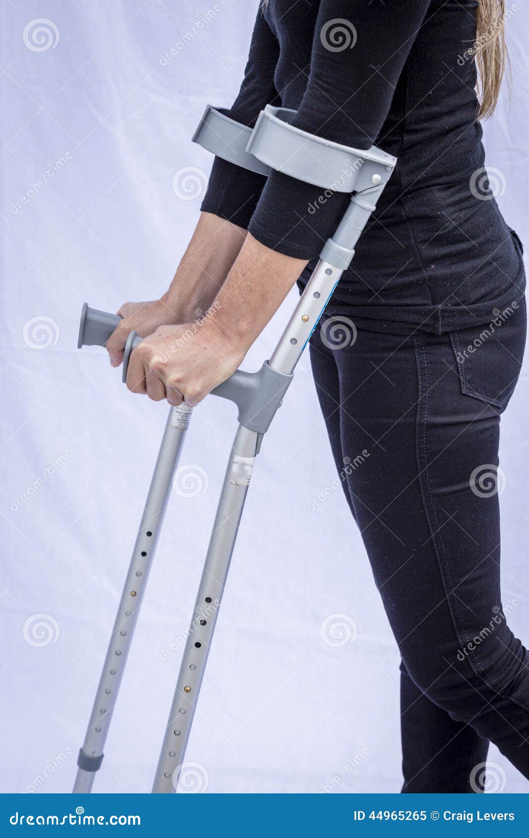 Woman with Crutches stock image. Image of female, disabled - 44965265