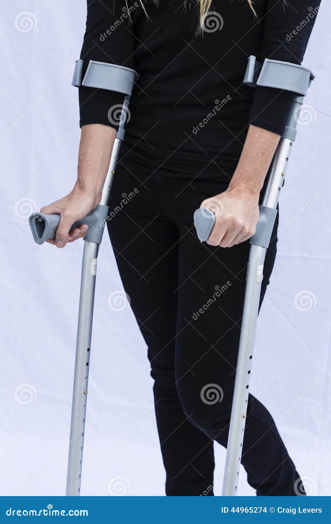 Woman with Crutches stock photo. Image of female, cripple - 44965274