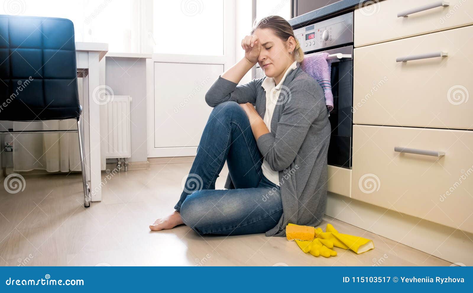 Young Woman Crying on Floor after Doing Housework Stock Image - Image ...