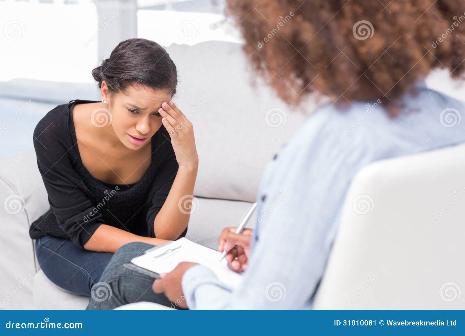 Woman Crying on Sofa while Therapist is Taking Notes Stock Image ...