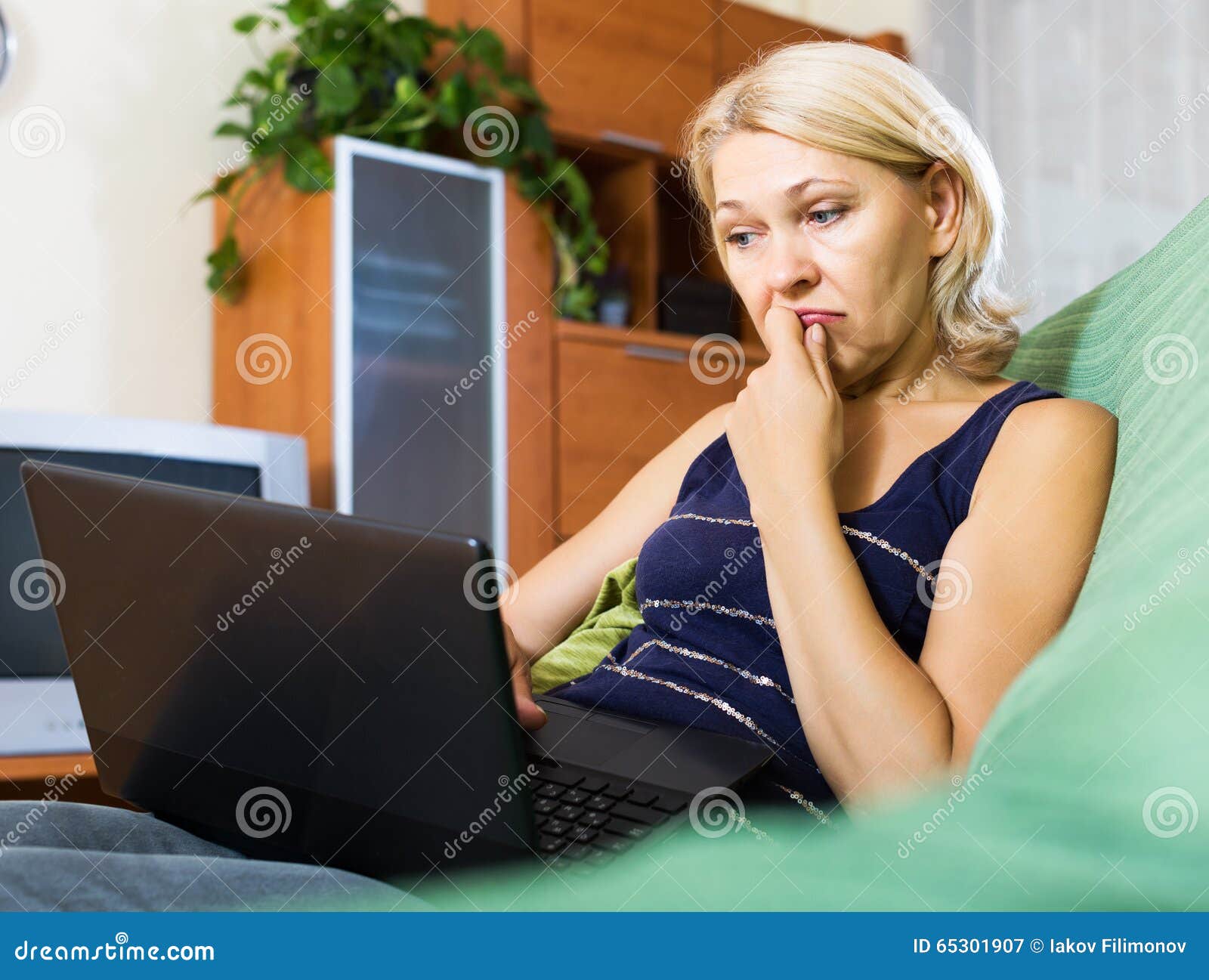Woman Crying while Using Laptop Stock Image - Image of indoor ...