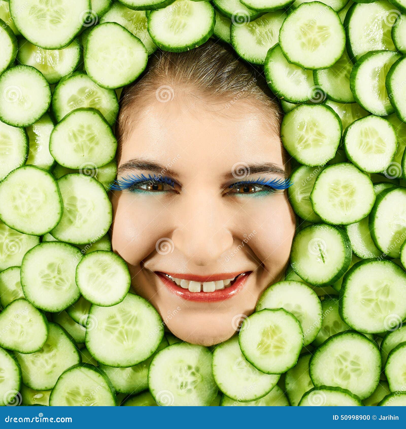 Woman and cucumber stock photo. Image of concept, fresh - 50998900