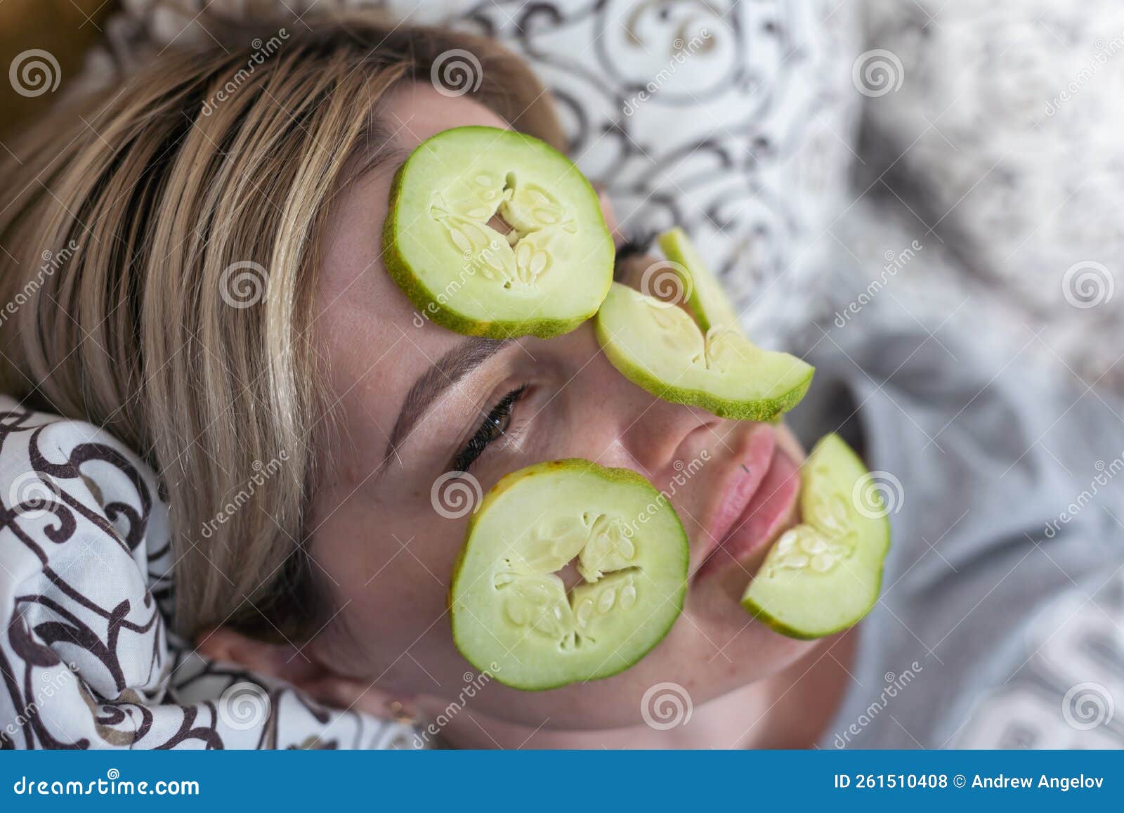 A Woman with a Cucumber on Her Face Stock Photo - Image of body, mask ...