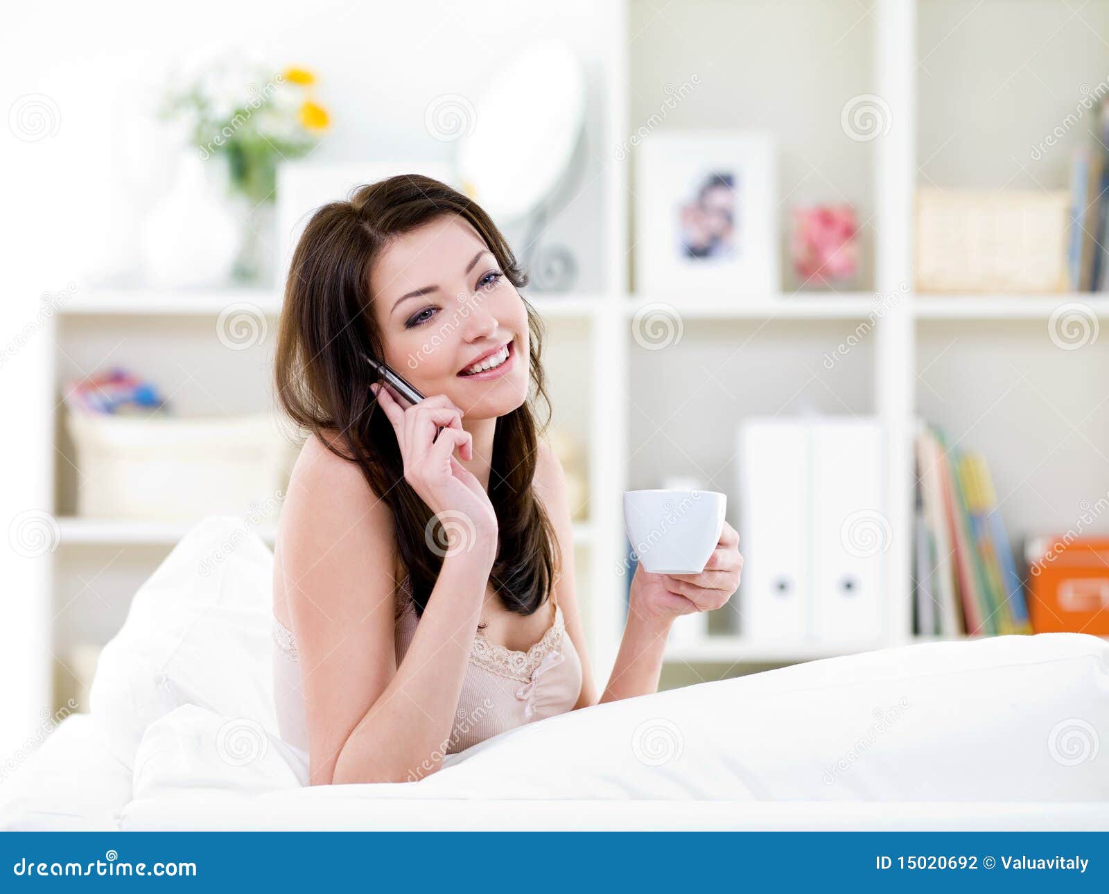 Woman with Cup Speaking by Mobile Phone Stock Photo - Image of young ...