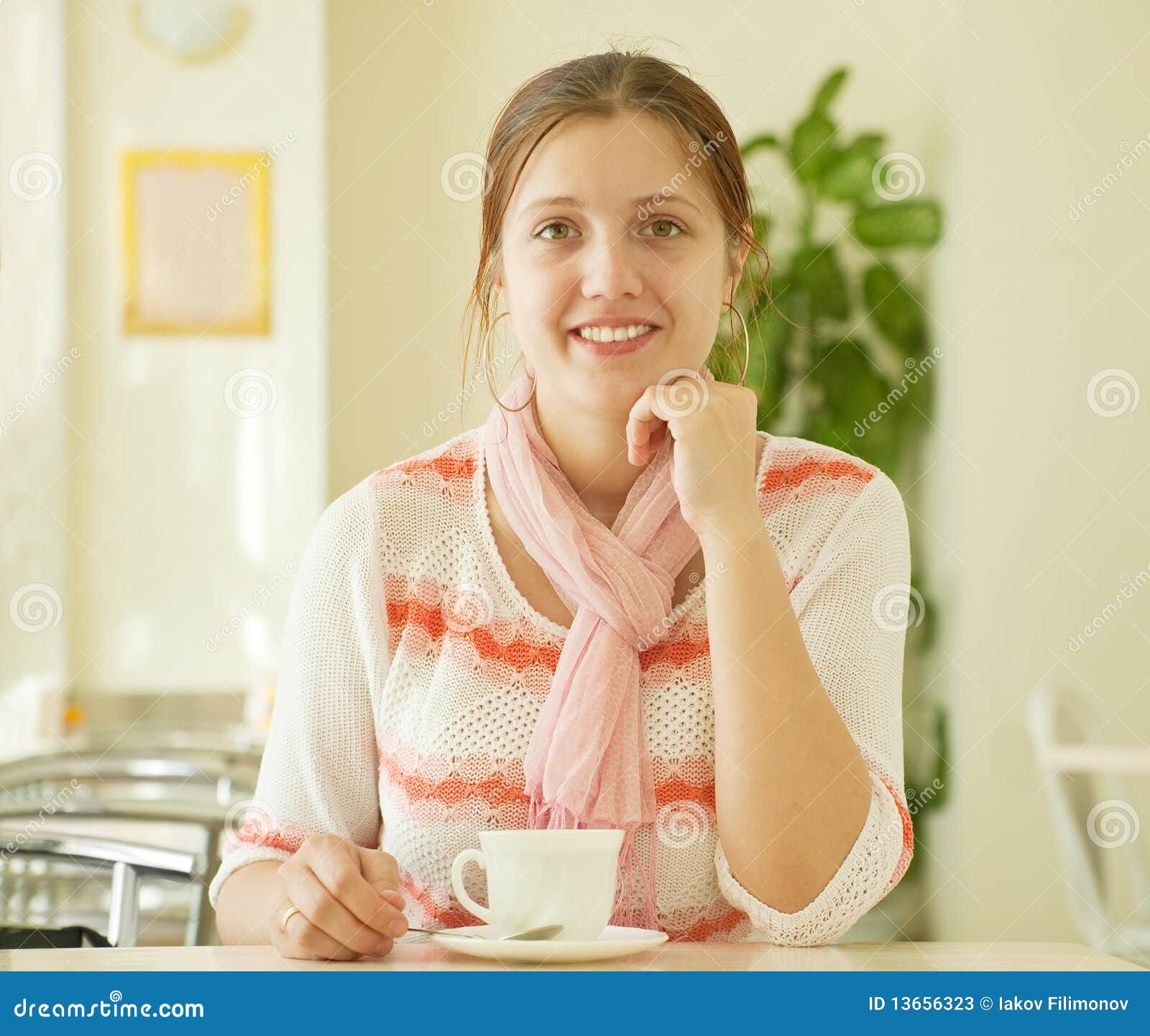 Woman with a cup of tea stock image. Image of happiness - 13656323