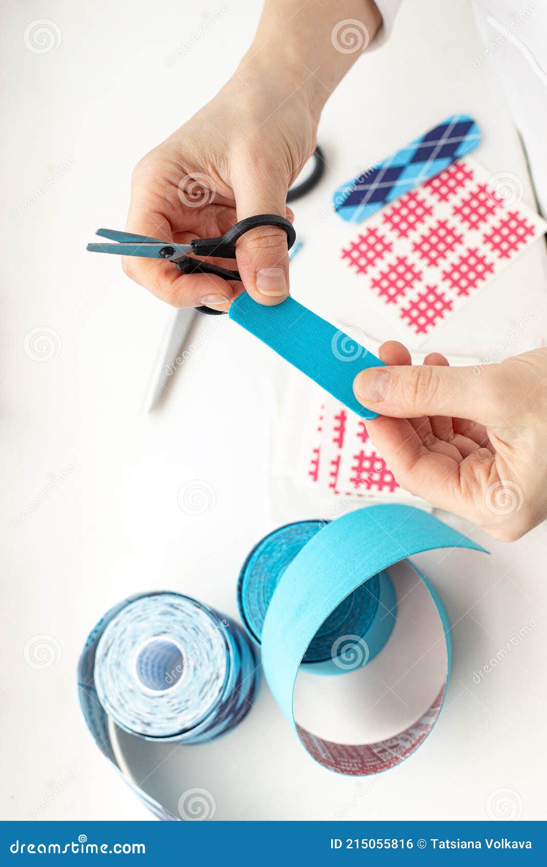 Woman Cut with Scissors Kinesio Tape on White Background Stock Photo ...