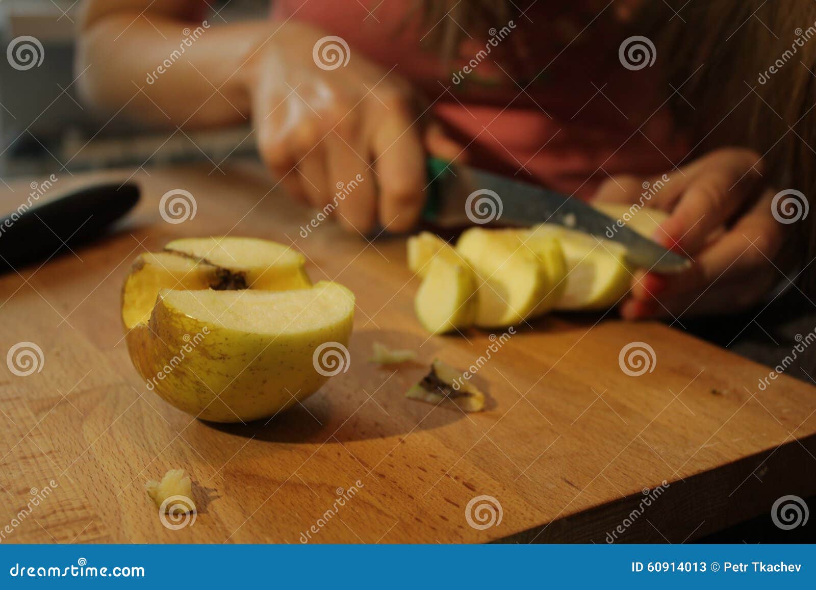 Woman is Cutting Apples in the Kitchen Stock Image - Image of apple ...