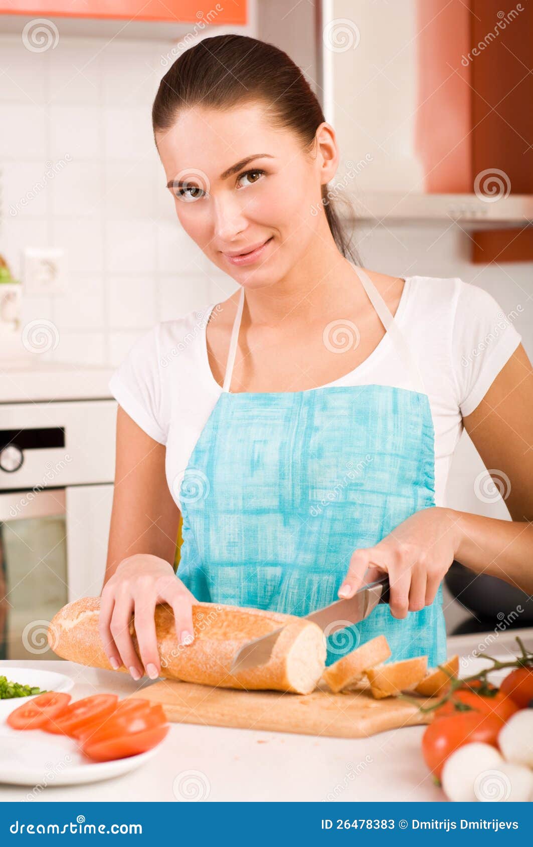Woman Cutting Bread on the Kitchen Stock Image - Image of kitchen ...