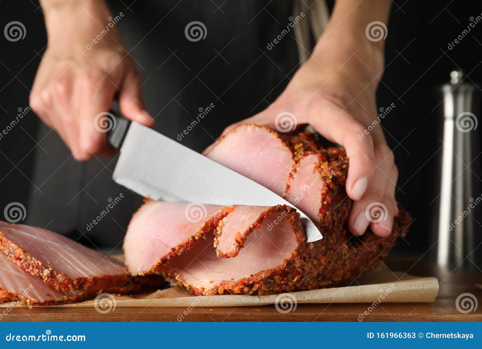 Woman Cutting Ham for Dinner at Table Stock Image - Image of eating ...