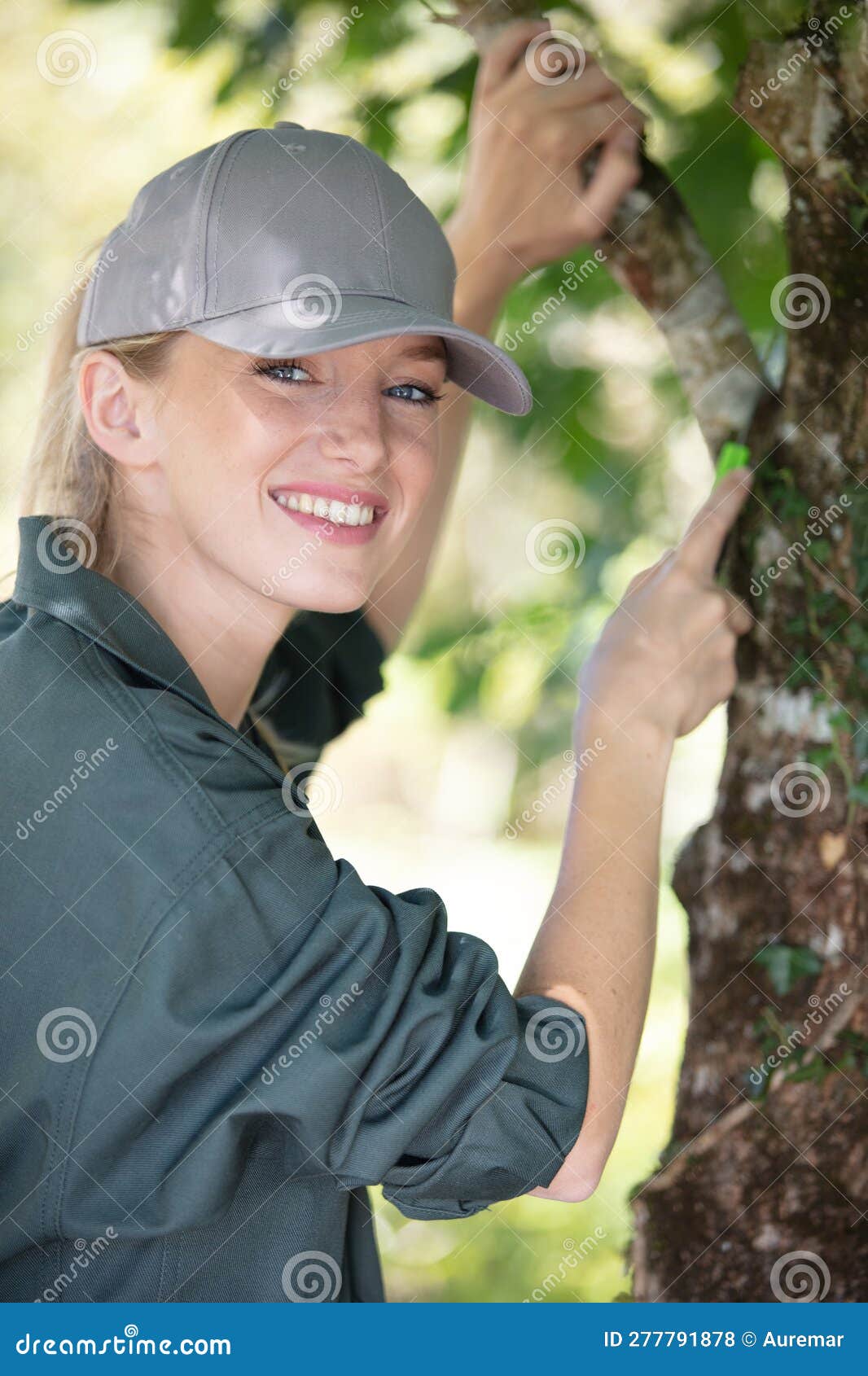 Woman Cutting Tree Branch in Garden Stock Photo - Image of people ...