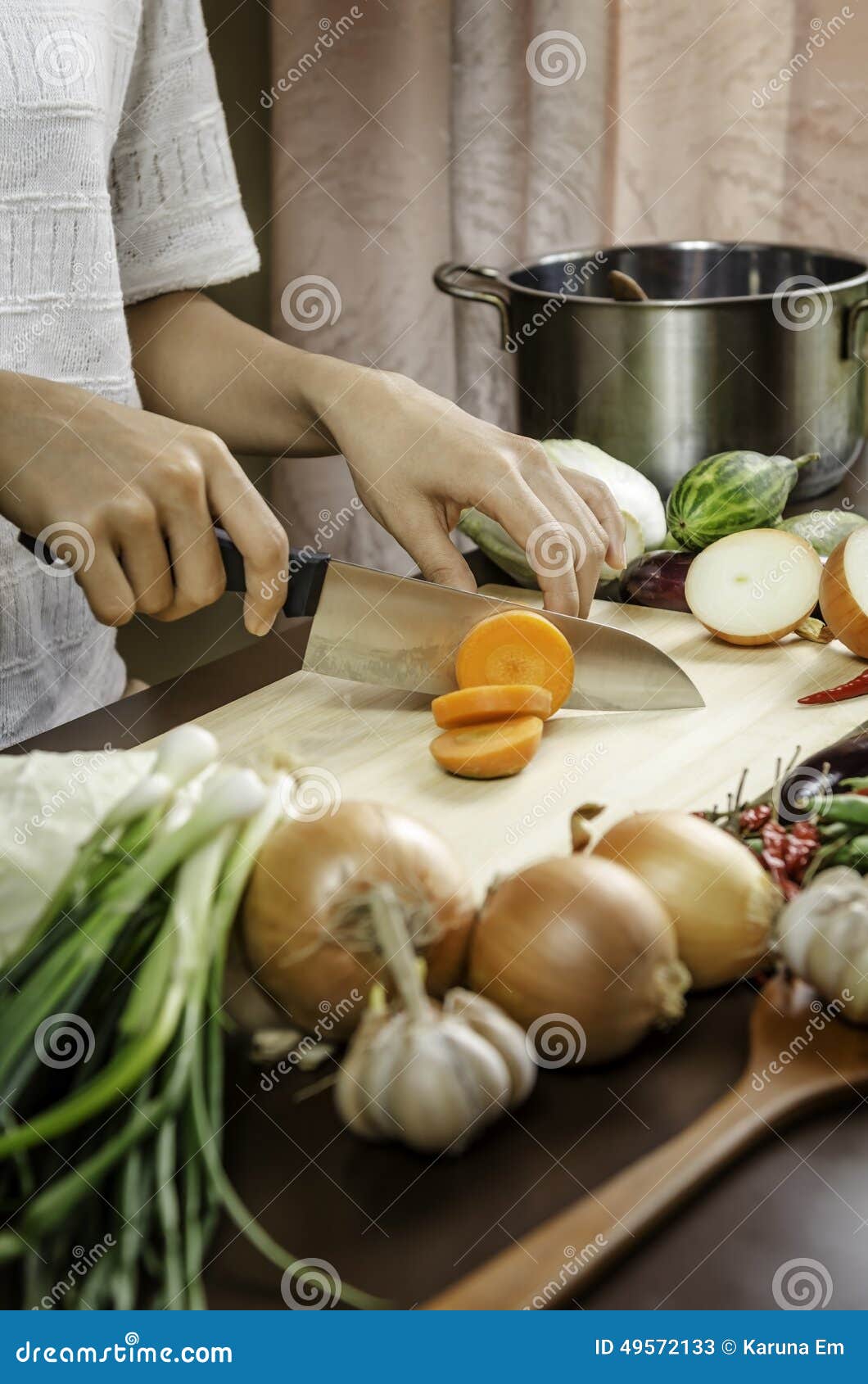 Woman cutting vegetables stock image. Image of kitchen - 49572133