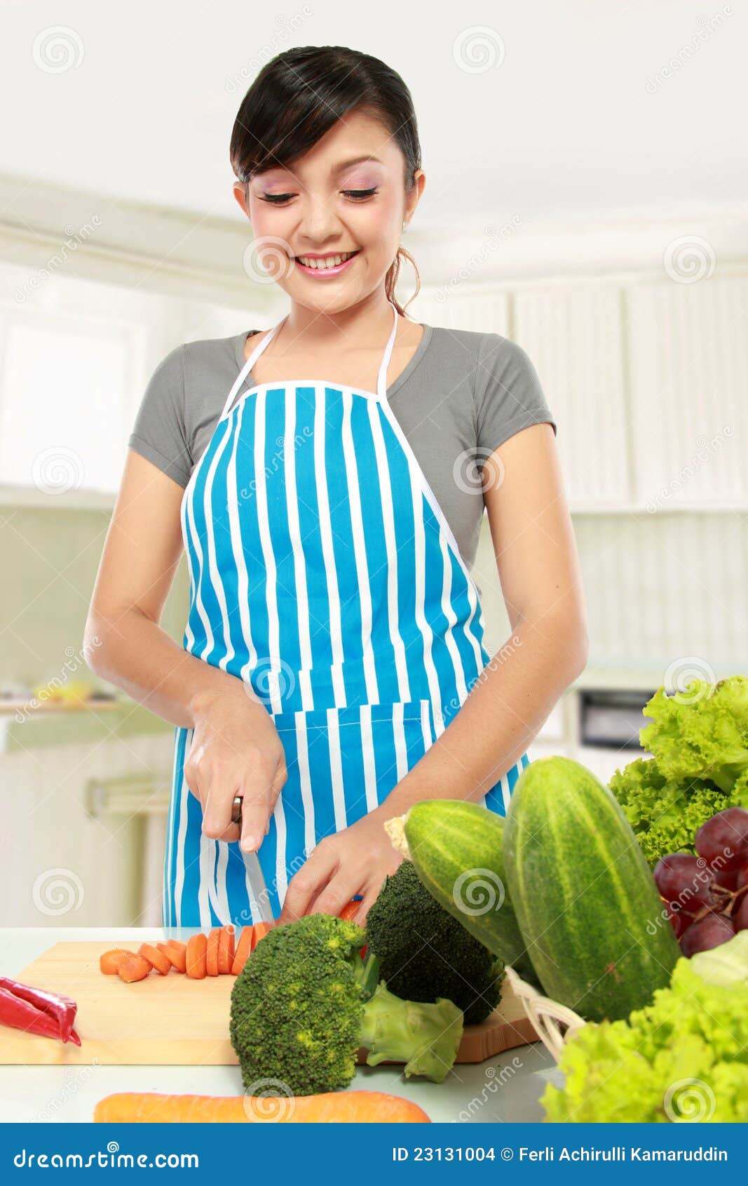Woman Cutting Vegetables in the Kitchen Stock Photo - Image of ...