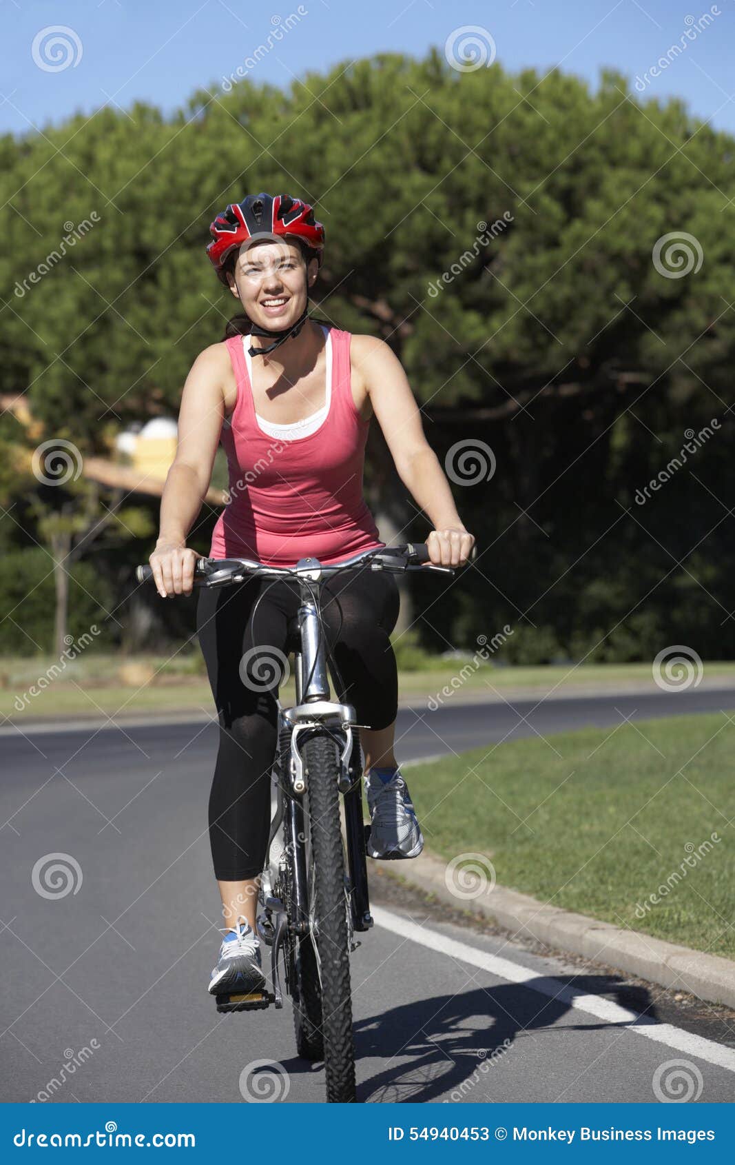 Woman on Cycle Ride stock image. Image of ride, wearing - 54940453