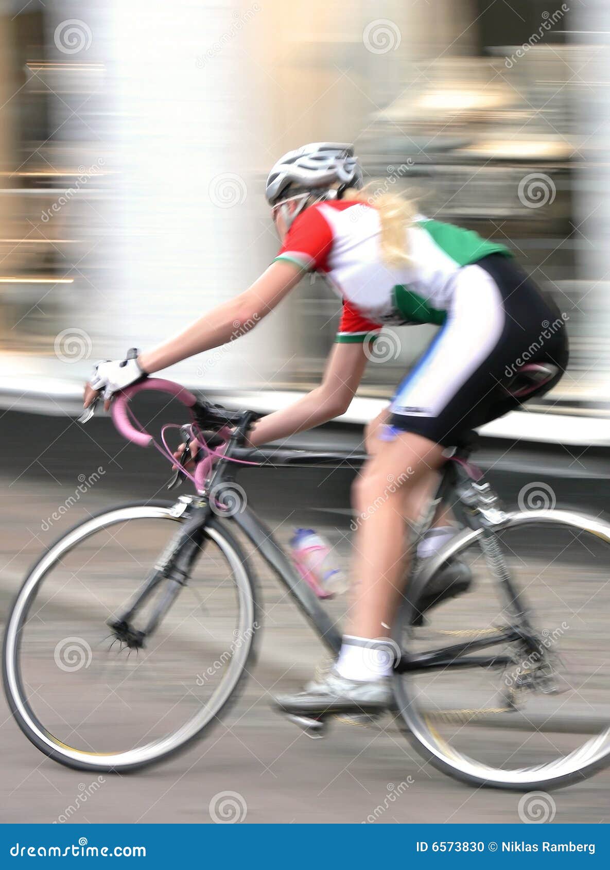 Woman Cyclist Racing Past stock photo. Image of activity - 6573830