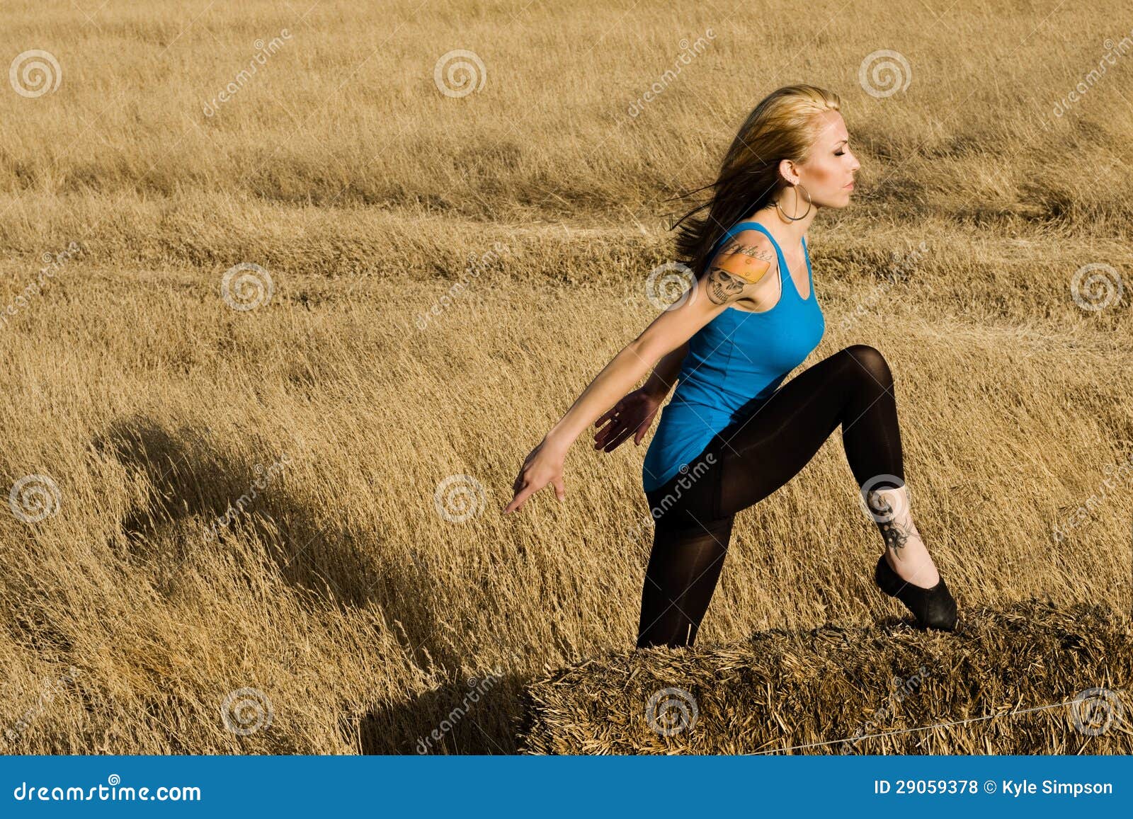 Woman in Dance Pose in a Field of Grass Stock Photo - Image of healthy ...
