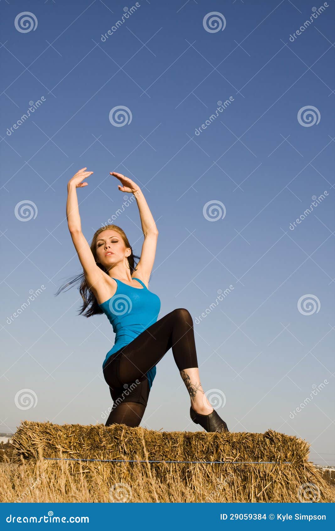 Woman in Dance Pose in a Field with Hay Stock Photo - Image of active ...