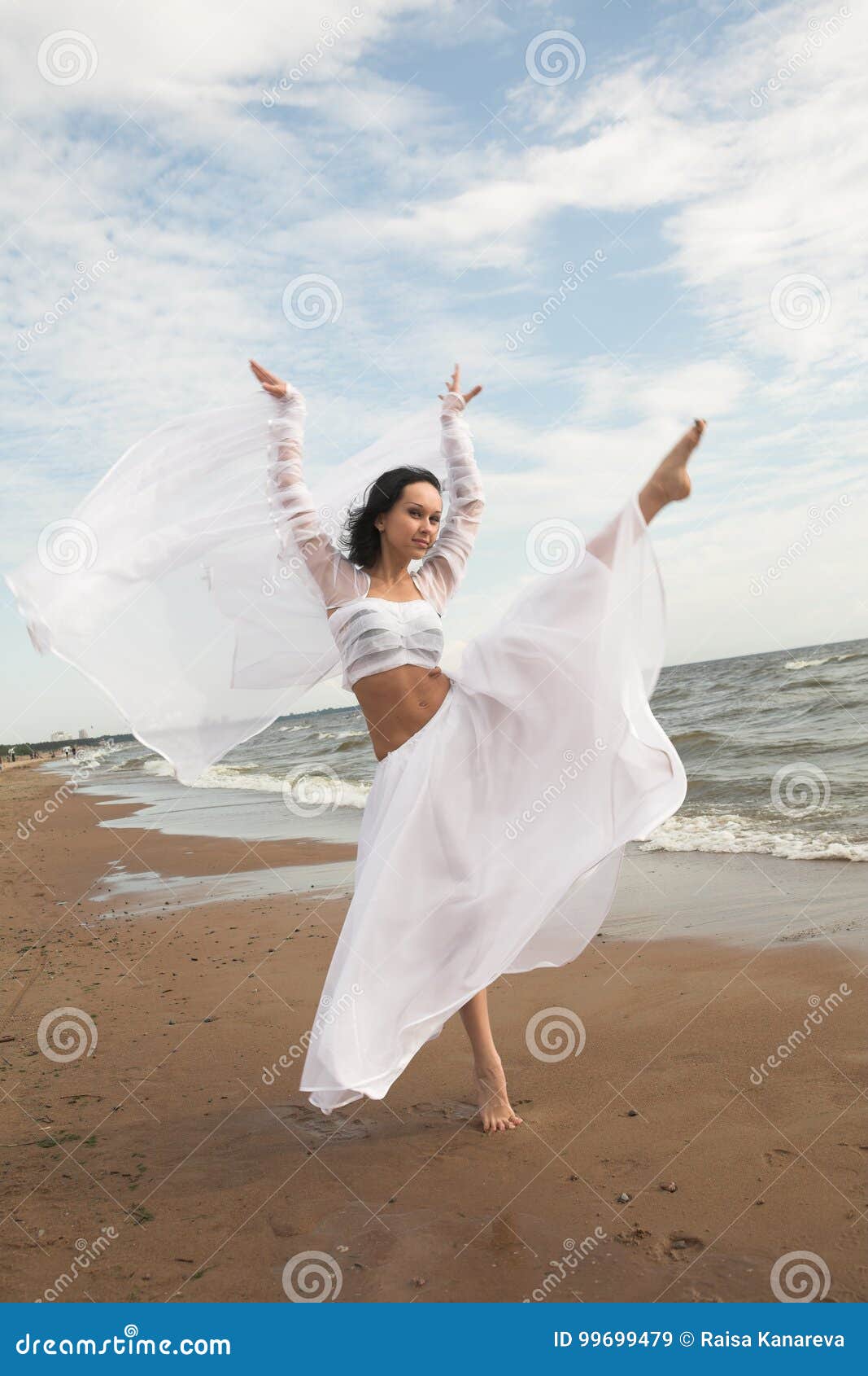 Woman dancing on the beach stock image. Image of classy - 99699479