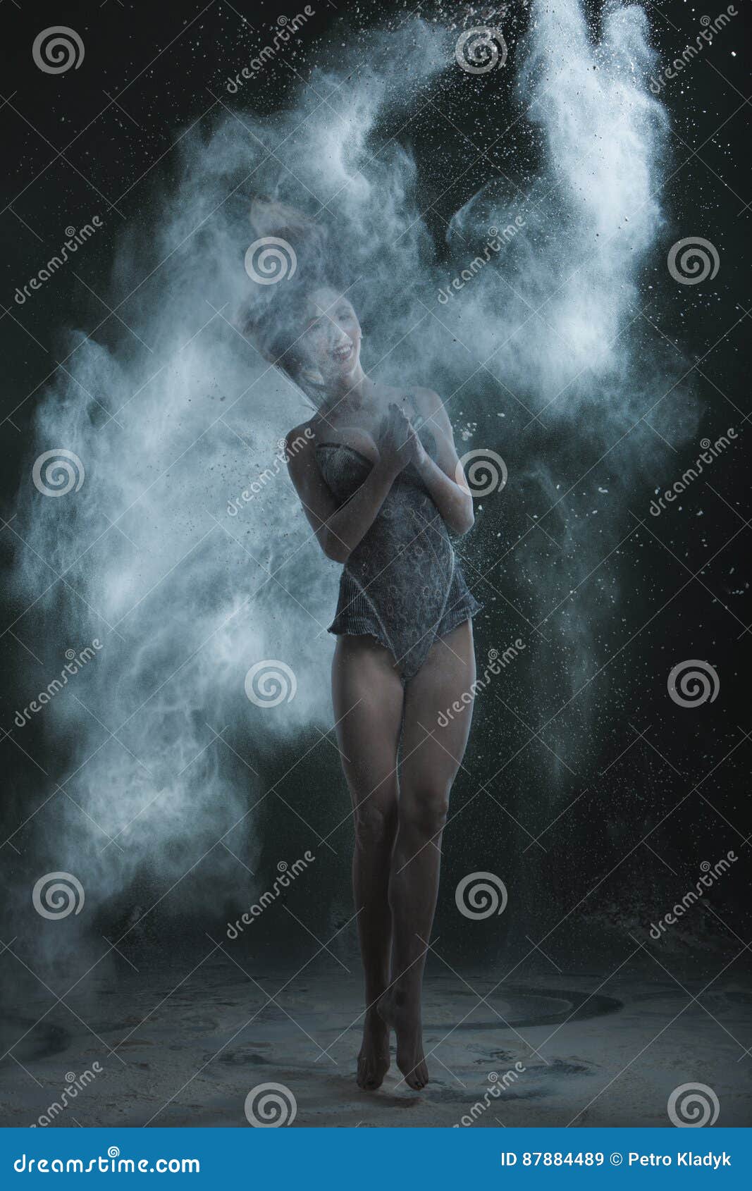 Woman is Dancing in a Cloud of Dust. Stock Image - Image of beauty, beautiful: 87884489