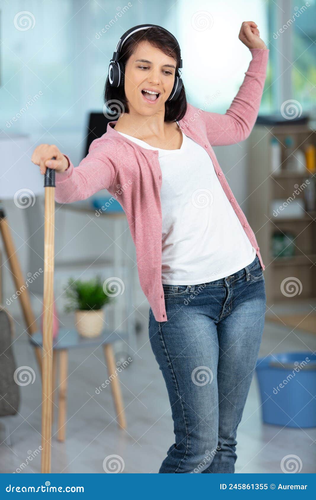 Woman Dancing and Singling while Mopping Floor Stock Image - Image of ...