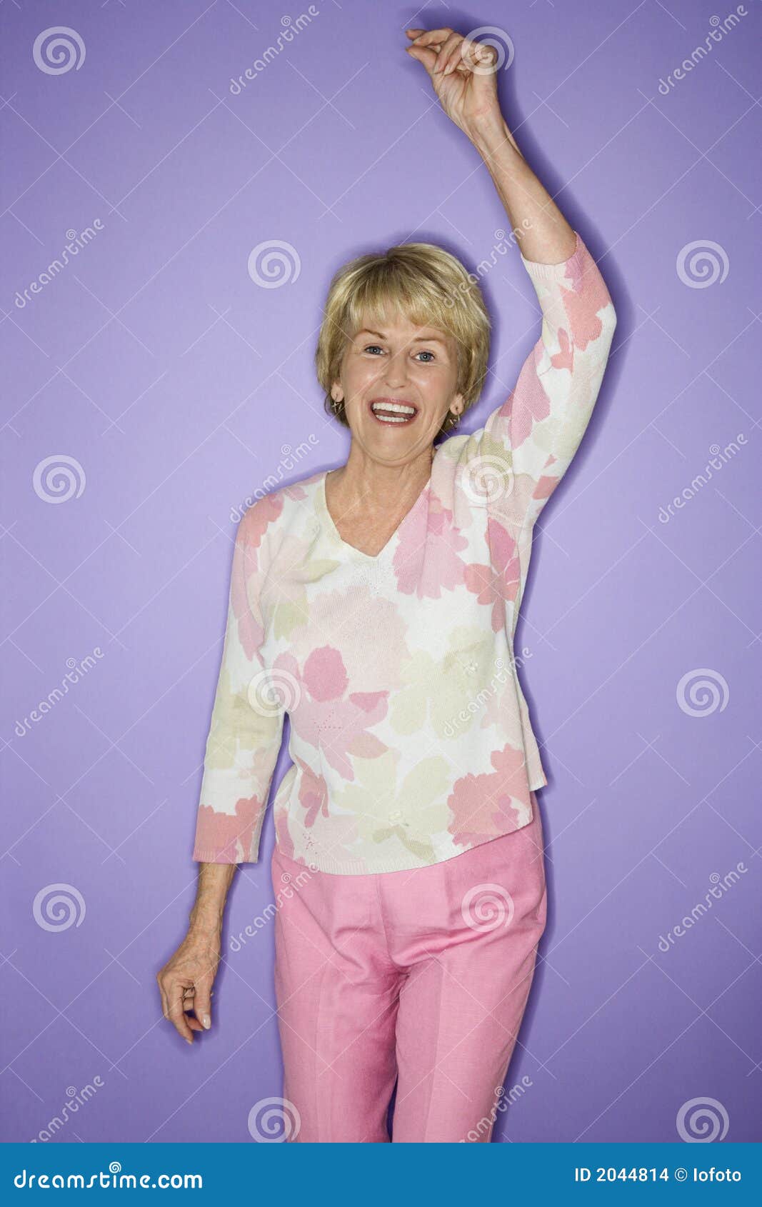Woman dancing and smiling. stock photo. Image of vertical - 2044814