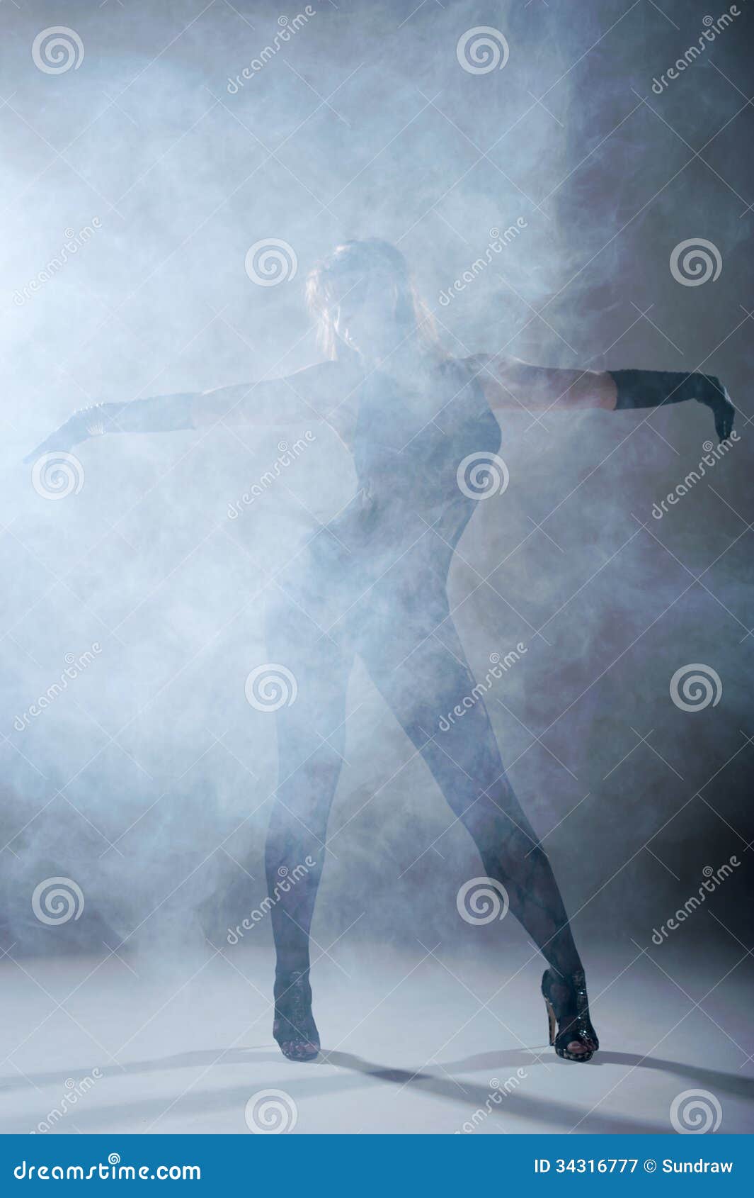 Woman dancing in a smoke. stock image. Image of blue - 34316777