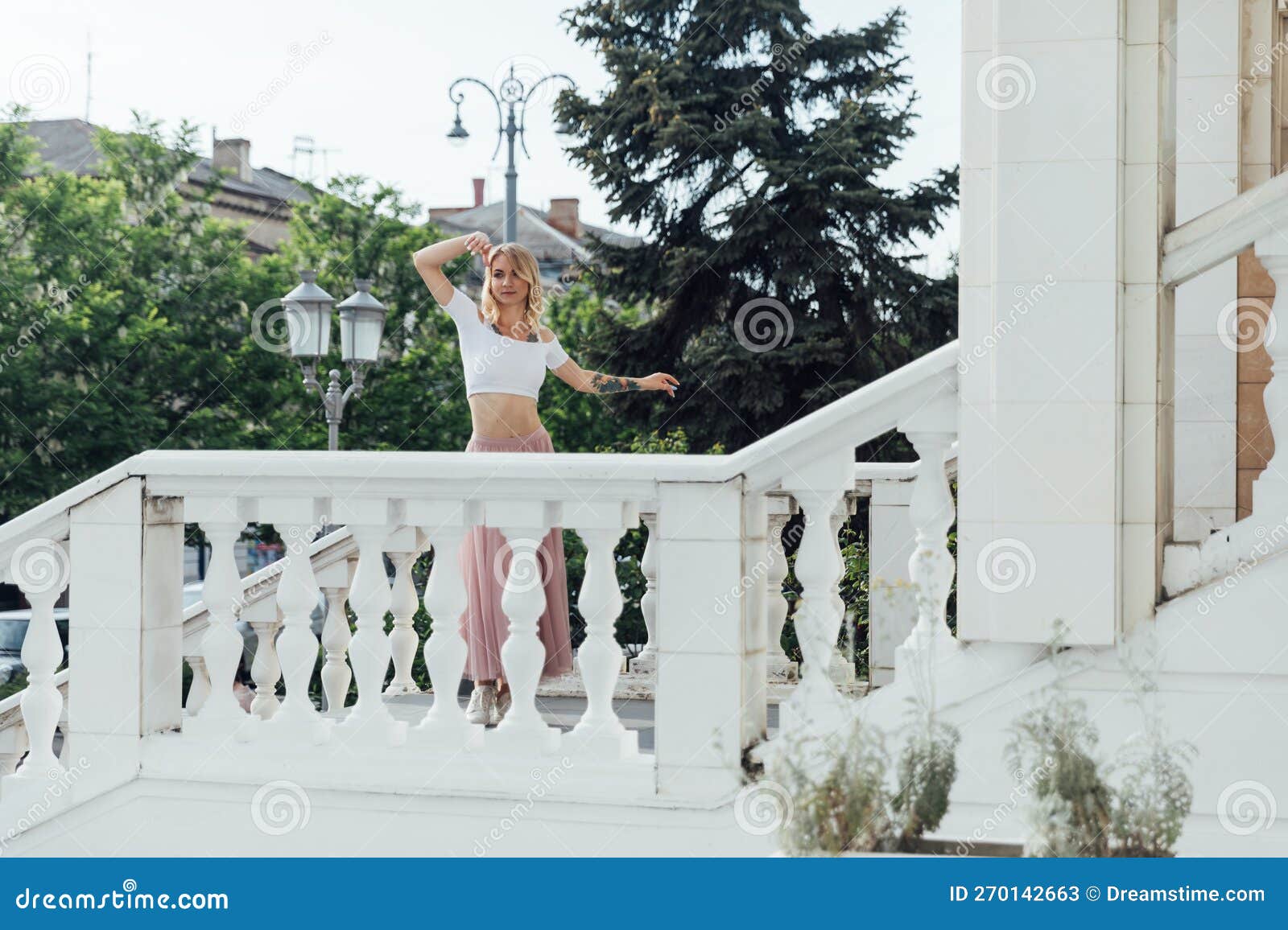 A Woman Dancing on the Stairs on the Street Alone Stock Image - Image ...