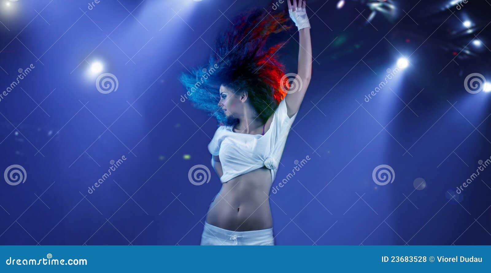 Woman Dancing Under Spotlights Stock Photo - Image of dark, clubbing ...