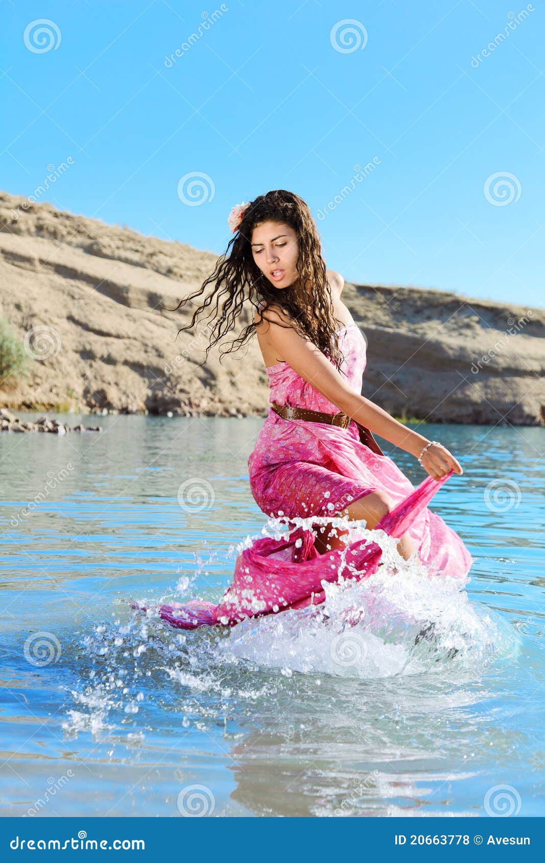 Woman dancing in water stock photo. Image of performer - 20663778