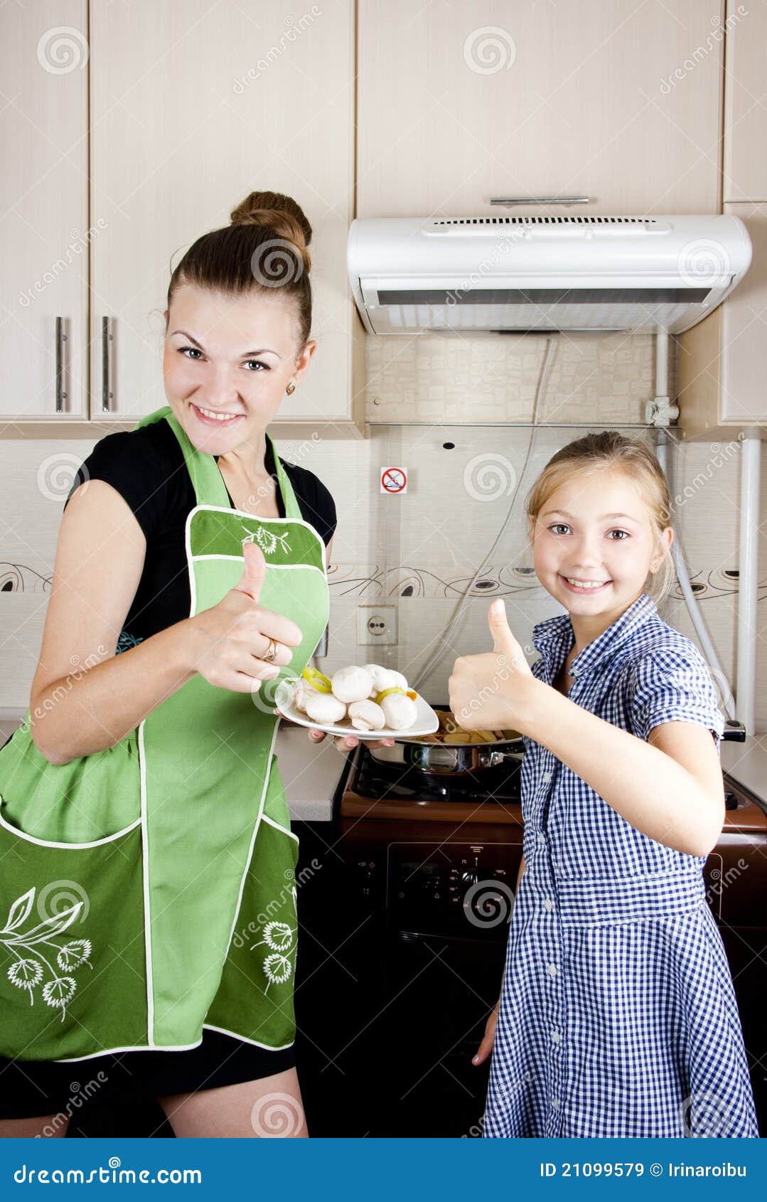 Woman with a Daughter in the Kitchen Preparing Stock Image - Image of ...