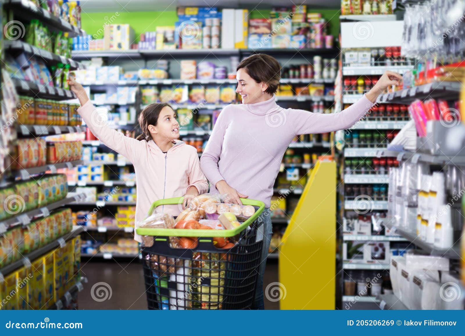 Woman with Daughter in Supermarket Stock Image - Image of care, indoors ... Woman with Daughter in Supermarket Stock Image - Image of care, indoors ...