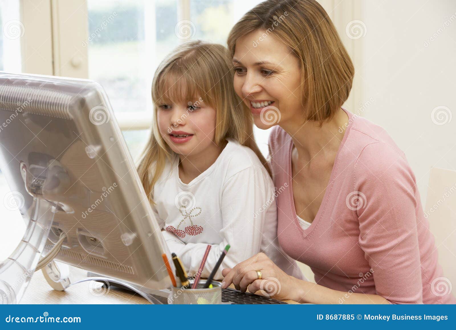 Woman and Daughter Using Computer Stock Image - Image of girl, mother ...