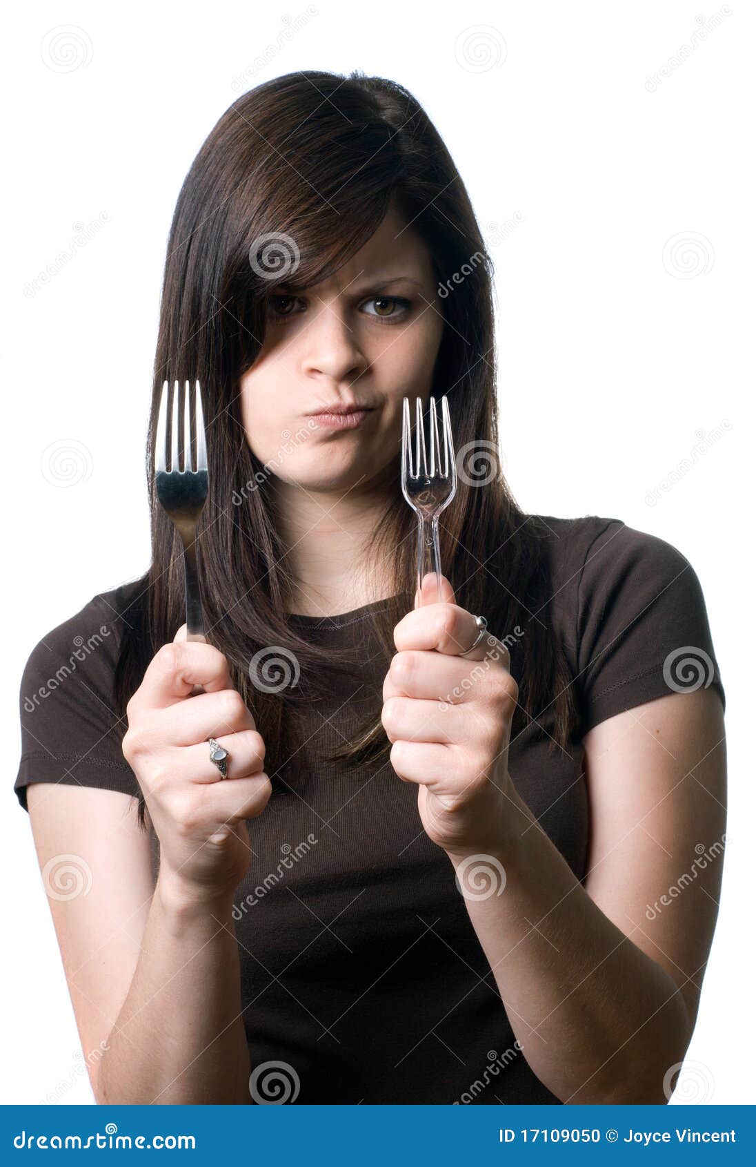 Woman Deciding between Plastic and Reusable Forks Stock Photo - Image ...