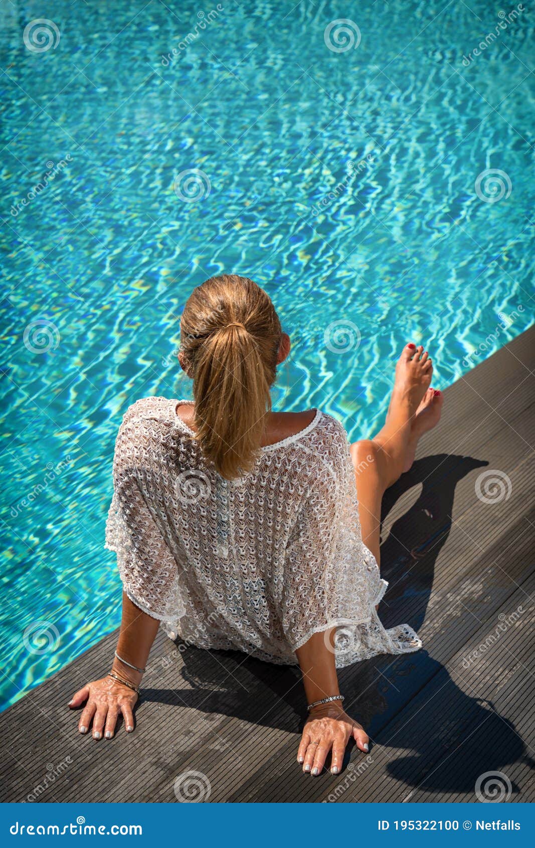 Woman on the Deck at the Swimming Pool Stock Photo - Image of page ...