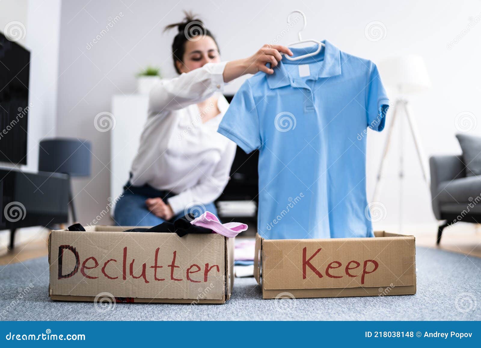 Woman Decluttering Clothes, Sorting Stock Photo - Image of house ...