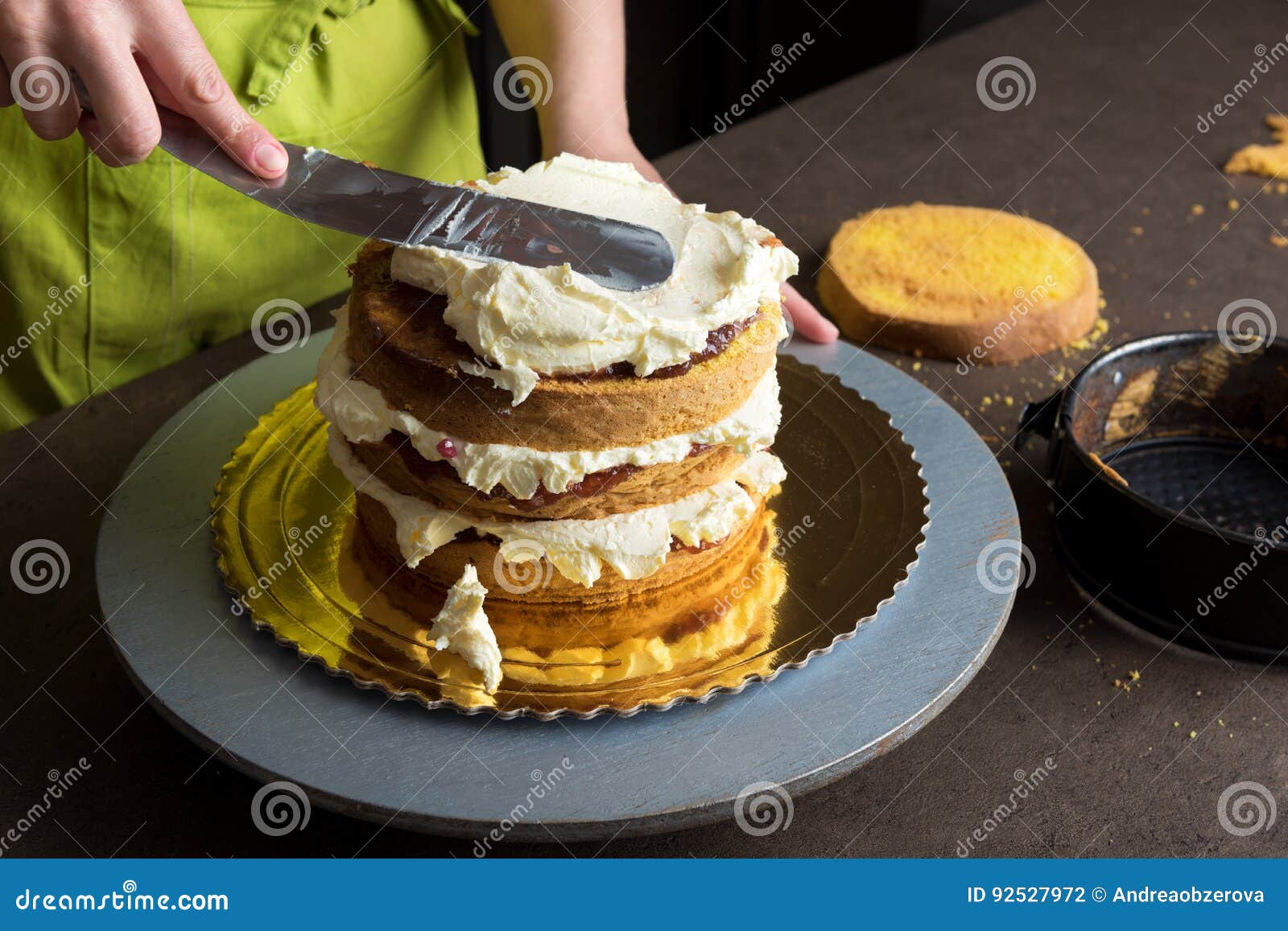 Woman Decorating a Cake with Icing Cream Stock Photo - Image of ...