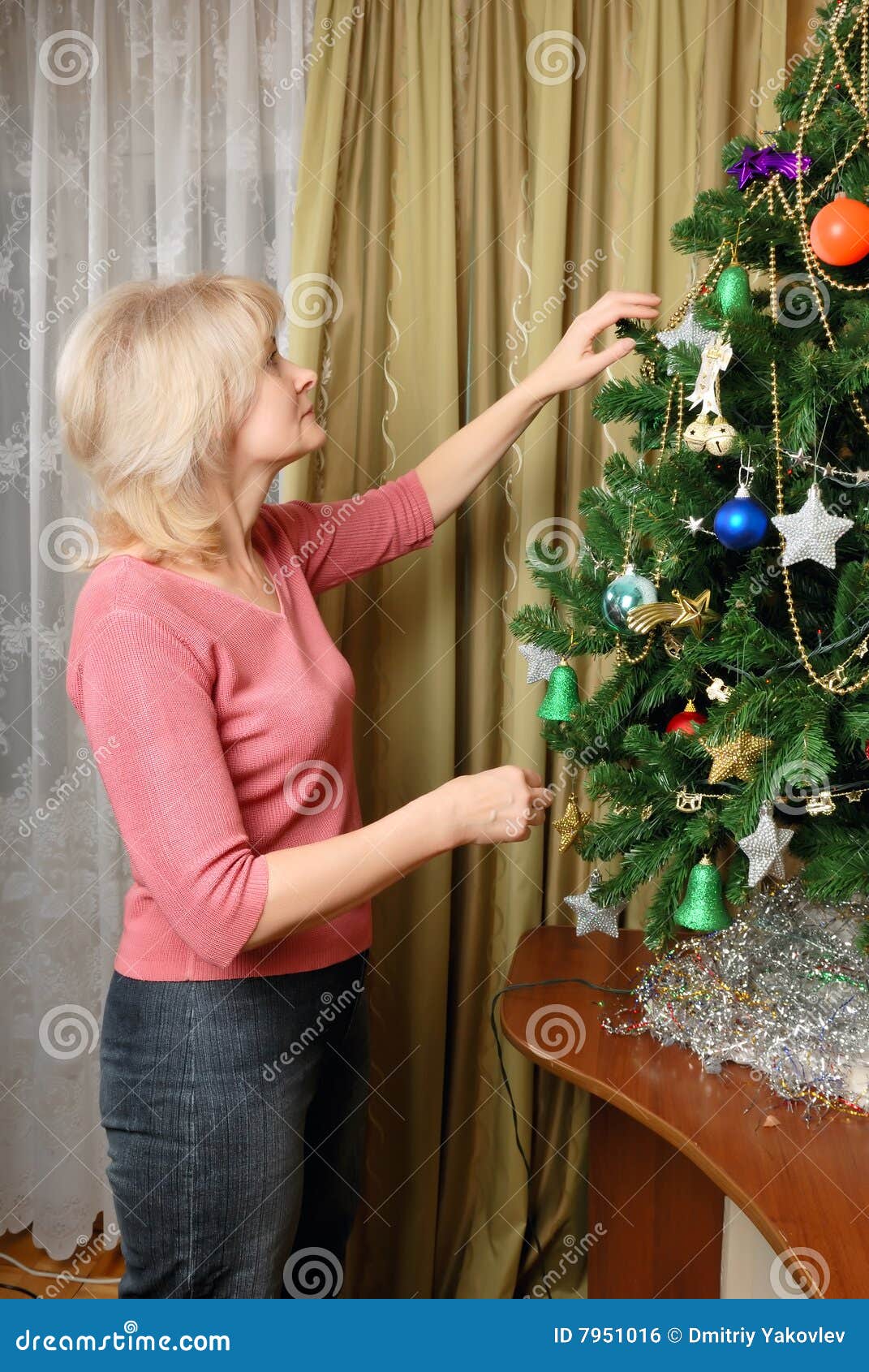 Woman Decorating Christmas Tree Stock Photo - Image of enjoyment, hair ...