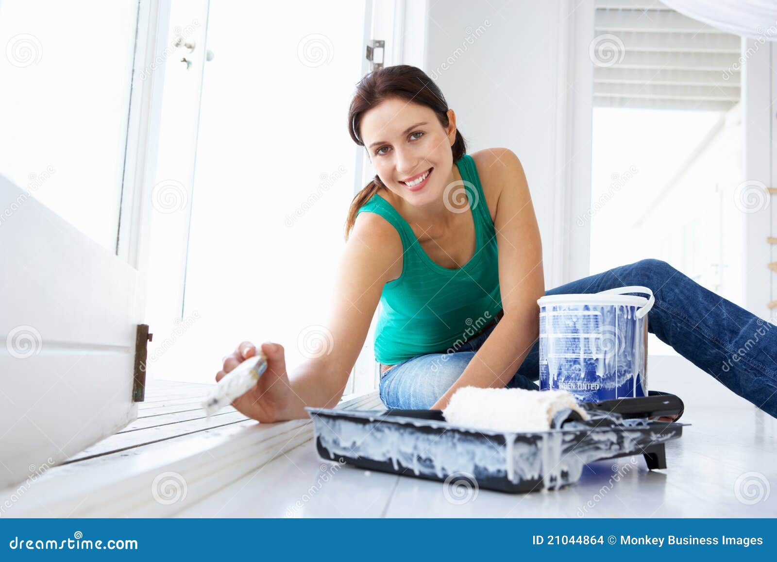 Woman decorating house stock photo. Image of redecorating - 21044864
