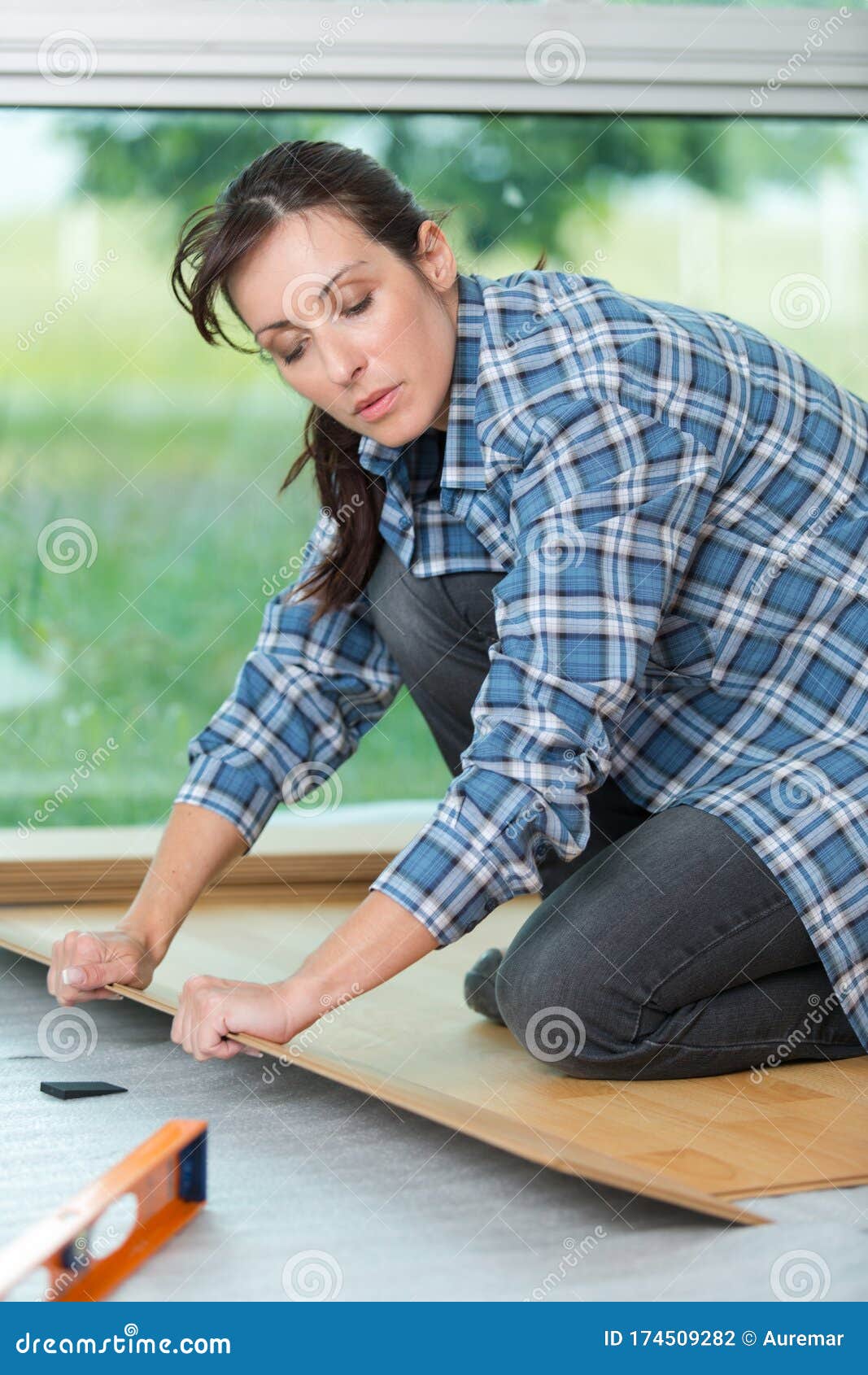 Woman Decorating Their House Stock Photo - Image of indoors, laminate ...