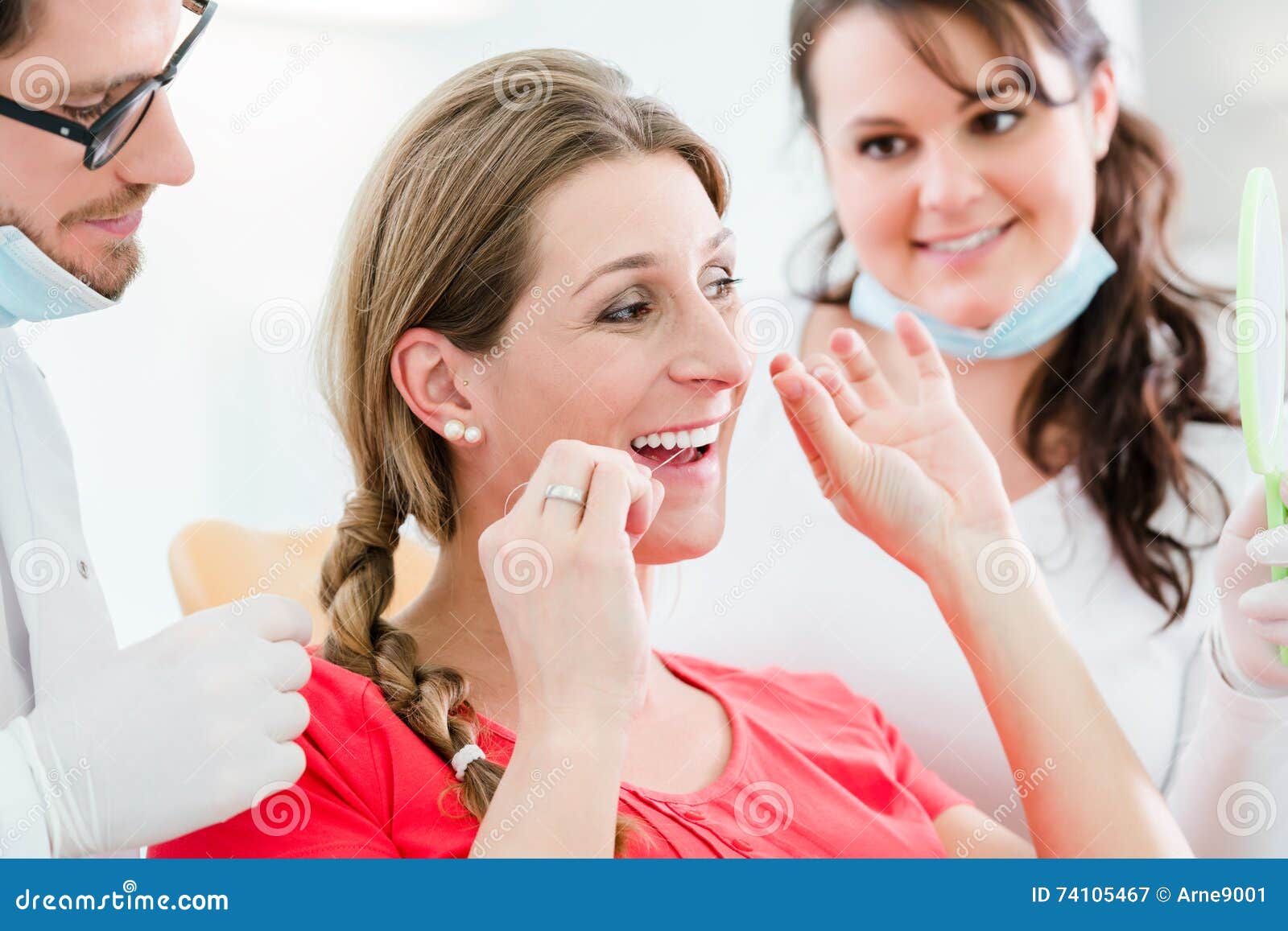 Dentist Using Occlusal Spray On Fixed Denture Royalty-Free Stock ...