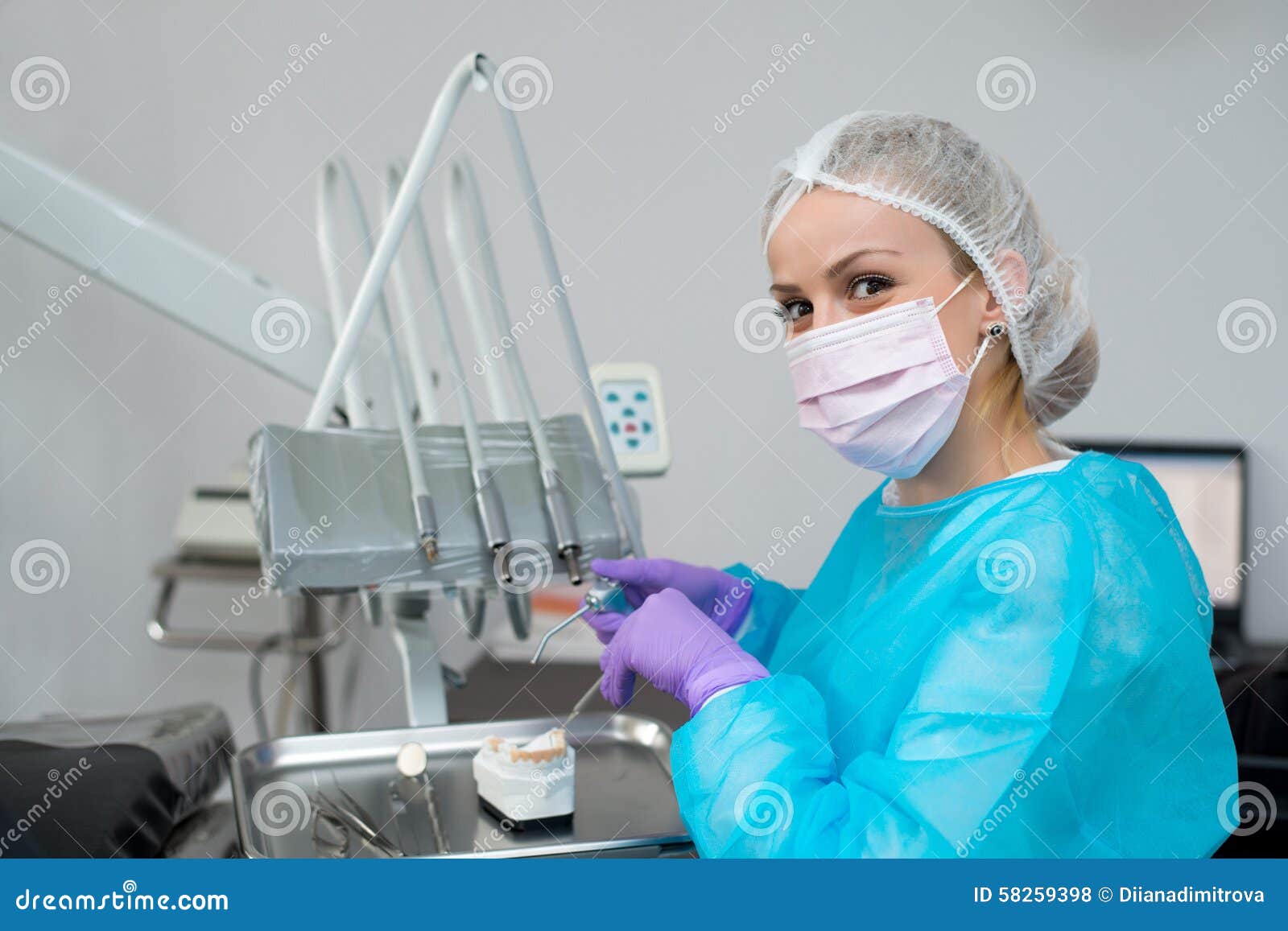 Woman dentist stock photo. Image of tool, professional - 58259398