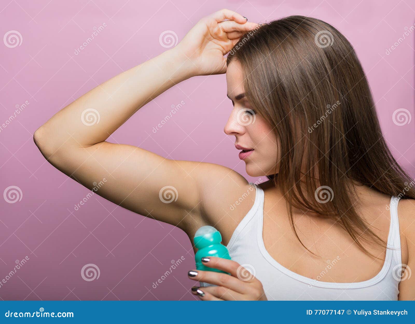 Woman with a deodorant stock image. Image of makeup, brown - 77077147
