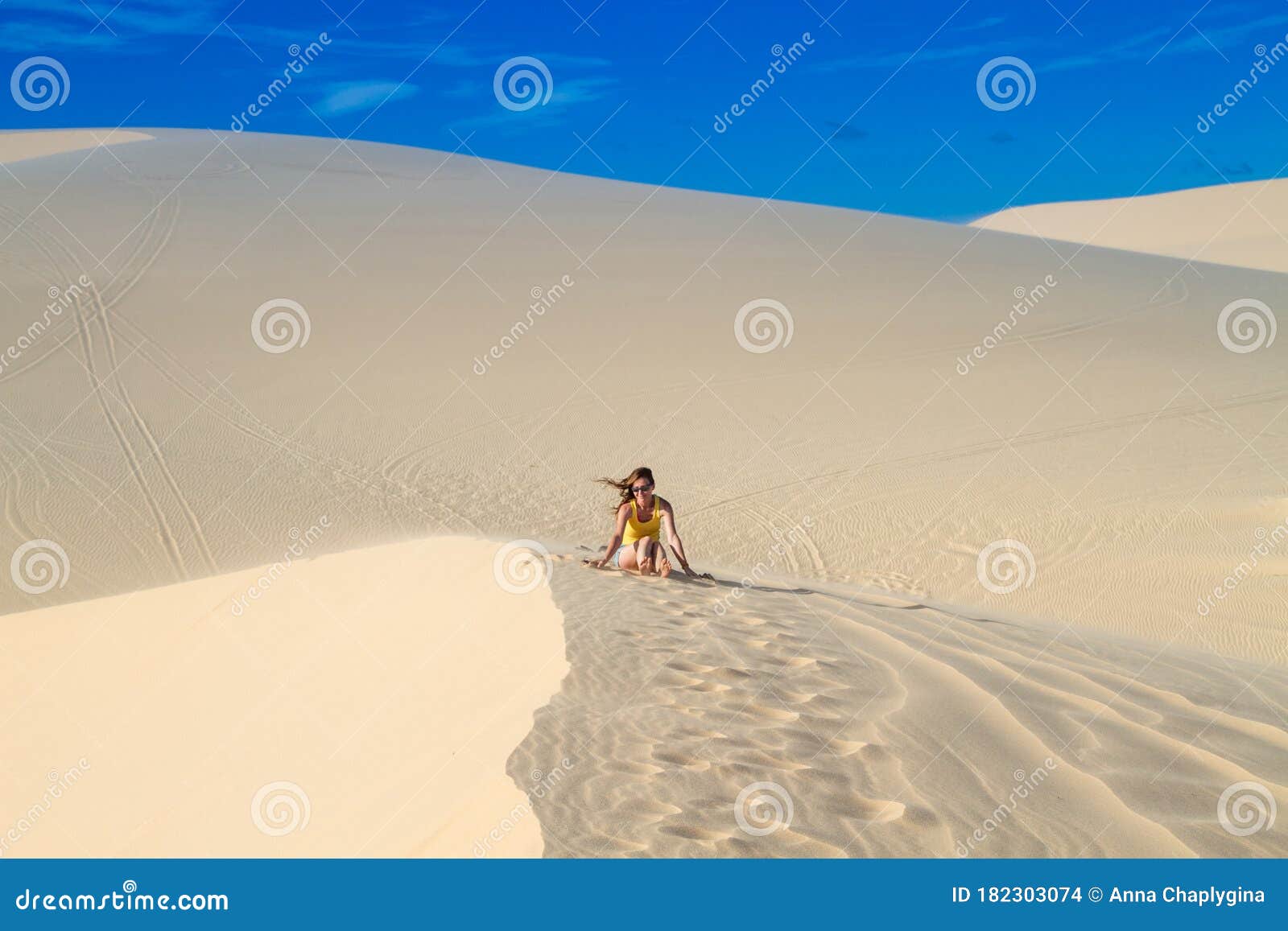 Woman in the Desert, Sitting on the Sand, Alone. Stock Photo - Image of ...