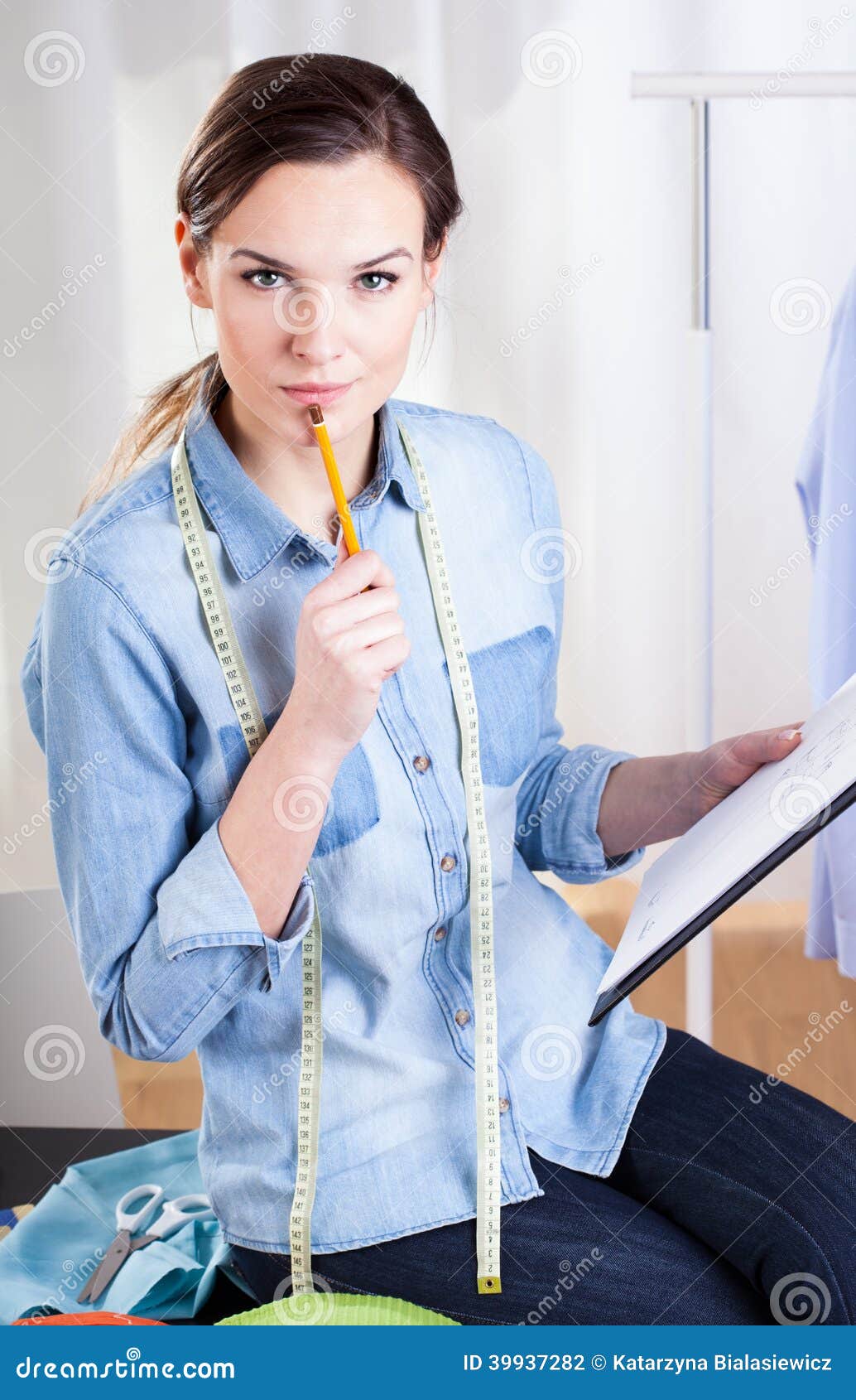 Woman designing clothes stock photo. Image of clothing - 39937282
