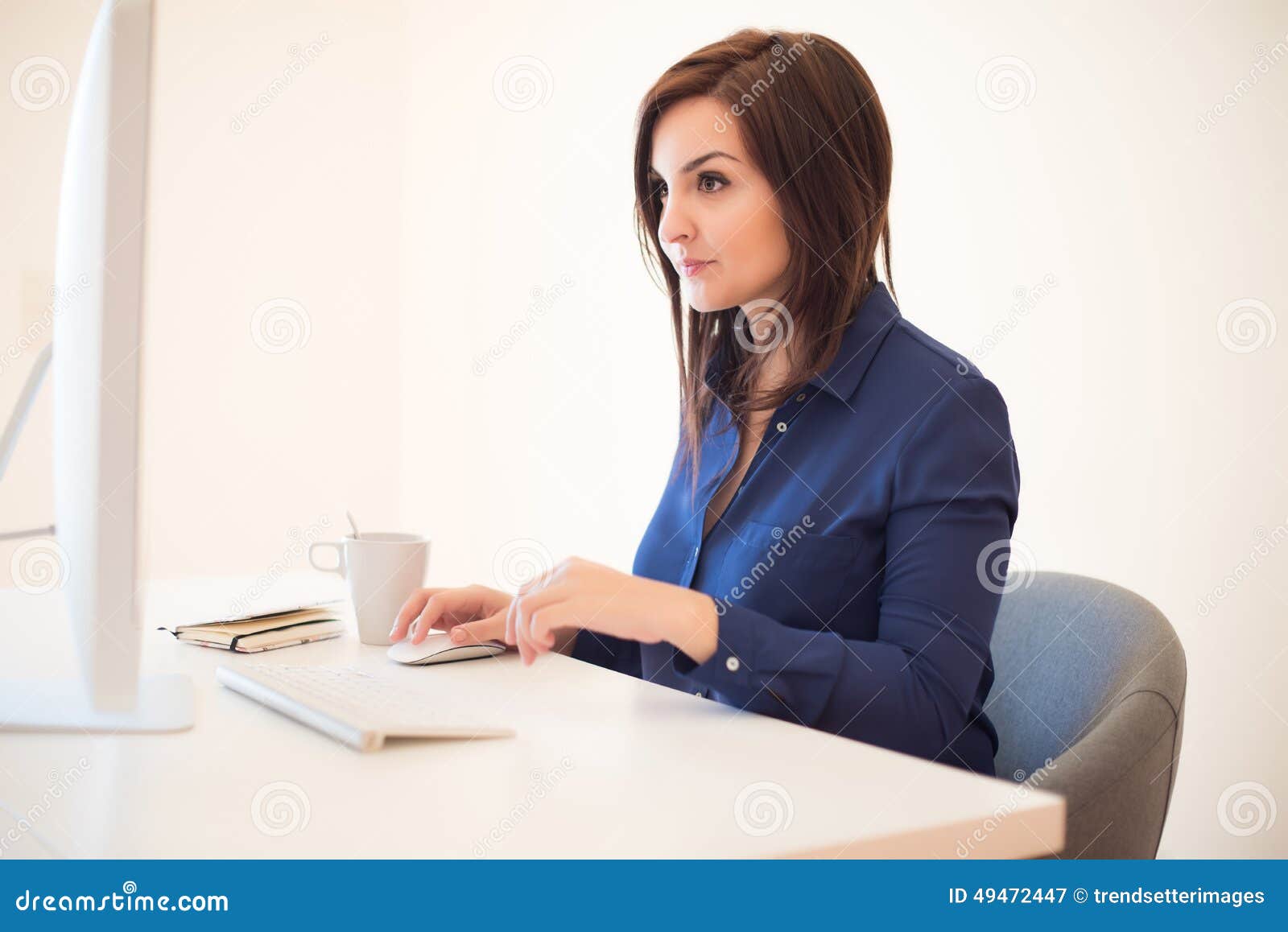 Woman on desk stock image. Image of professional, looking - 49472447