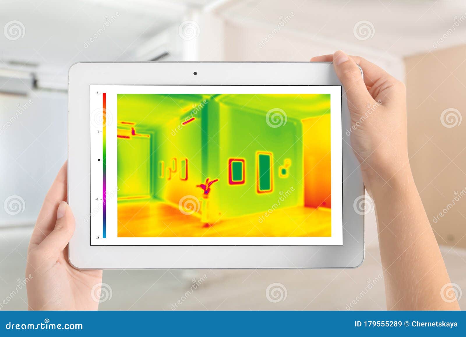 Woman Detecting Heat Loss in Room Using Thermal Viewer. Energy ... Woman Detecting Heat Loss in Room Using Thermal Viewer. Energy ...