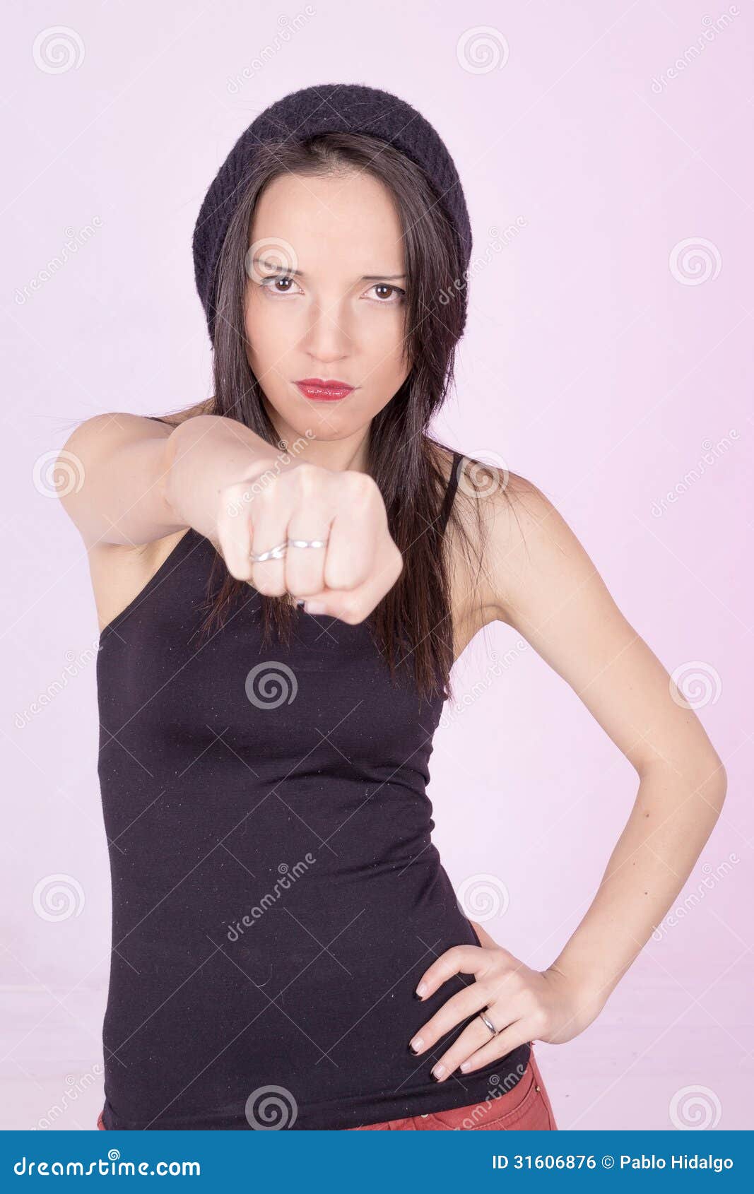 Woman Determined Throwing a Punch Stock Photo - Image of female, face ...
