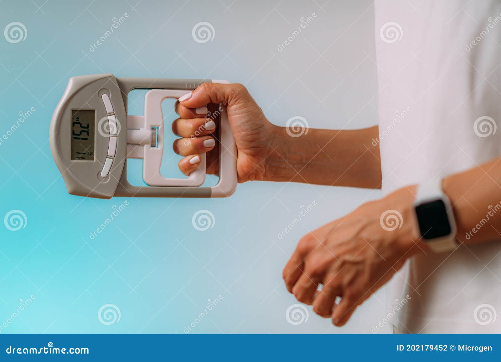 Woman with Digital Hand Grip Dynamometer, Measuring Strength Stock ...