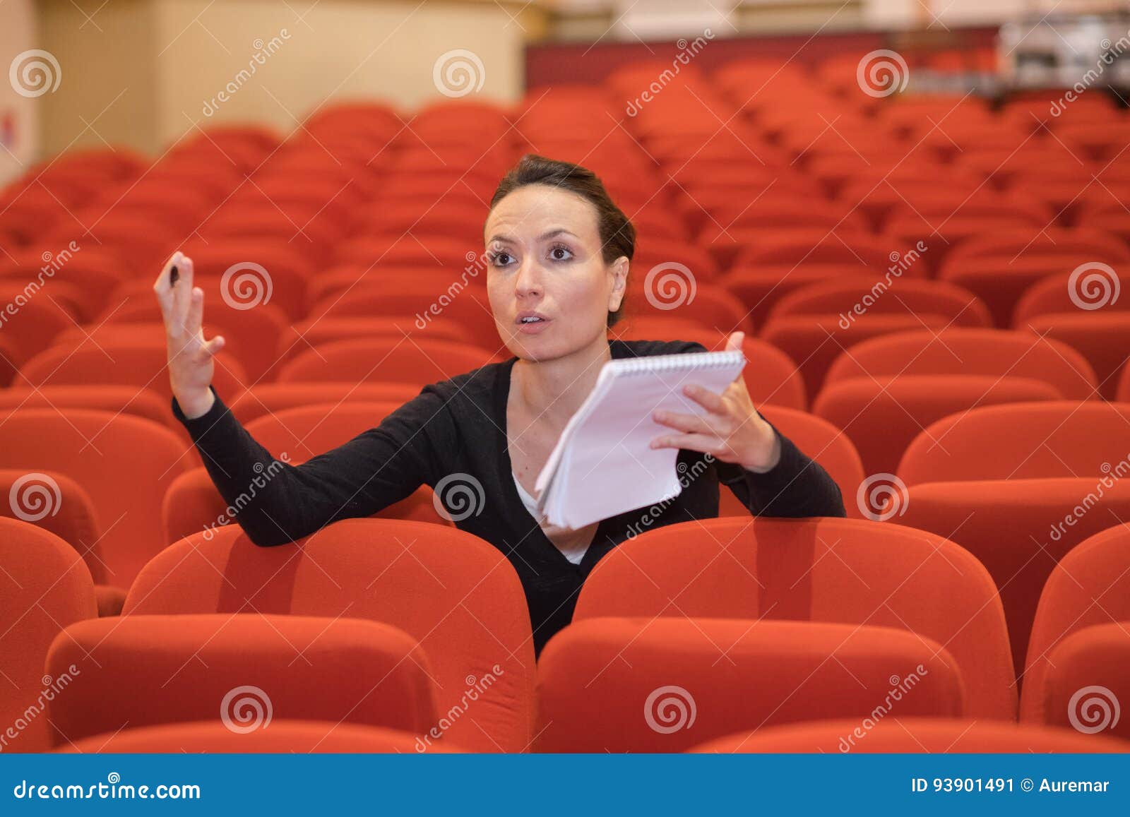Woman directing in theater stock image. Image of ceremony - 93901491
