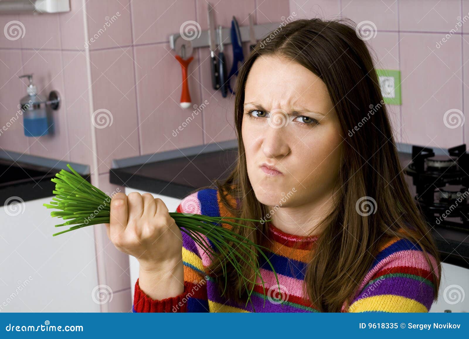 Woman dislike vegetables stock image. Image of interiour - 9618335